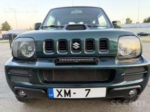 Zaļš Suzuki Jimny 2009 Rīga, ar dzinēja tilpumu 1.50 L un nobraukumu 202 tūkst. km par 8900 €, foto 24 vietnē AUTOMOTO.COM.LV