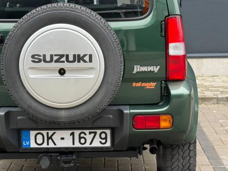 Zaļš Suzuki Jimny 2010 Rīga, ar dzinēja tilpumu 1.30 L un nobraukumu 233 tūkst. km par 7400 €, foto 12 vietnē AUTOMOTO.COM.LV
