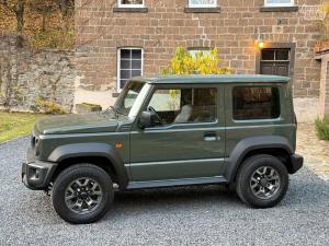 Green Suzuki Jimny 2023 in Kaunas, with an engine capacity of 1.50 L and mileage of 37 thousand km for 32546 €, photo 3 on AUTOMOTO.COM.LV