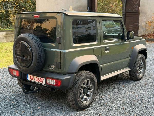 Green Suzuki Jimny 2023 in Kaunas, with an engine capacity of 1.50 L and mileage of 37 thousand km for 32546 €, photo 7 on AUTOMOTO.COM.LV