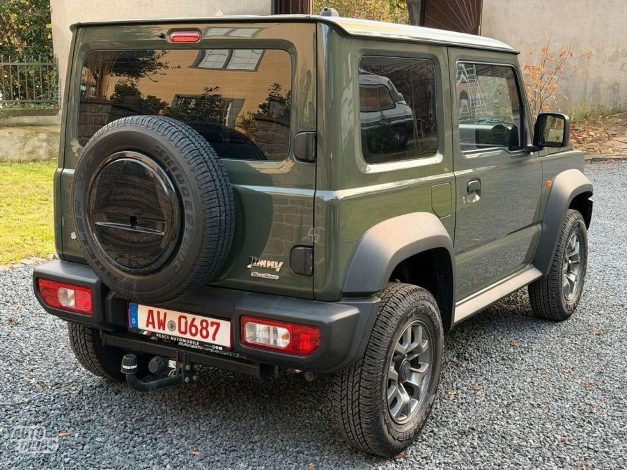 Green Suzuki Jimny 2023 in Kaunas, with an engine capacity of 1.50 L and mileage of 37 thousand km for 32546 €, photo 8 on AUTOMOTO.COM.LV