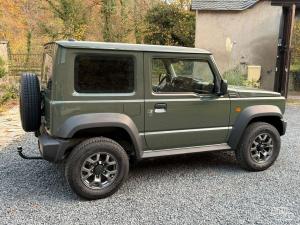Green Suzuki Jimny 2023 in Kaunas, with an engine capacity of 1.50 L and mileage of 37 thousand km for 32546 €, photo 9 on AUTOMOTO.COM.LV