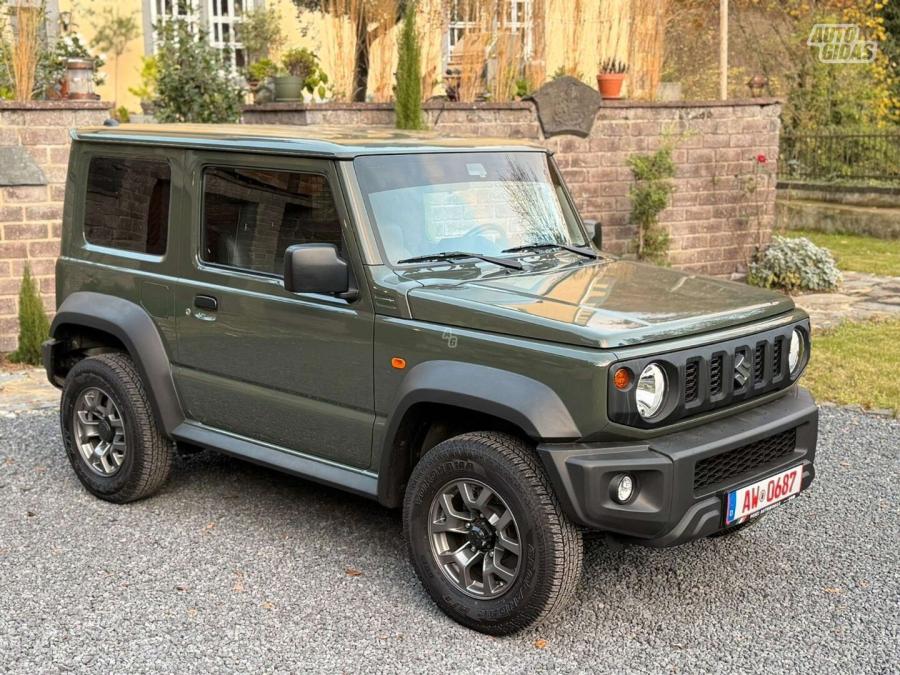 Green Suzuki Jimny 2023 in Kaunas, with an engine capacity of 1.50 L and mileage of 37 thousand km for 32546 €, photo 13 on AUTOMOTO.COM.LV