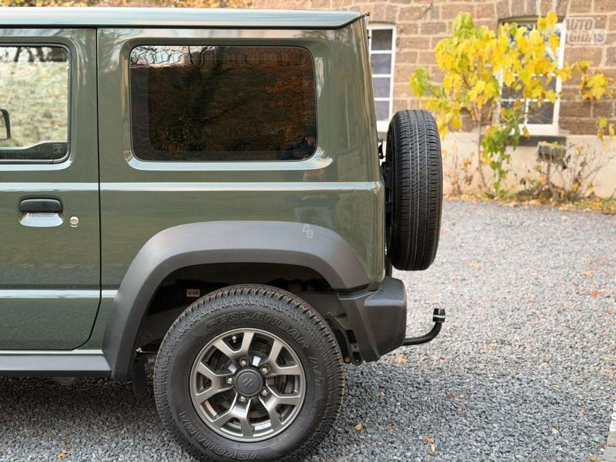 Green Suzuki Jimny 2023 in Kaunas, with an engine capacity of 1.50 L and mileage of 37 thousand km for 32546 €, photo 18 on AUTOMOTO.COM.LV