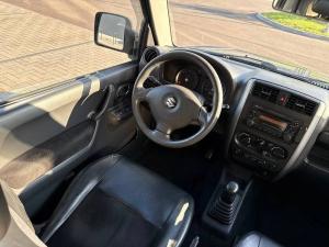 Grey Suzuki Jimny 2006 in Riga, with an engine capacity of 1.30 L and mileage of 146 thousand km for 9400 €, photo 13 on AUTOMOTO.COM.LV