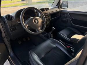 Grey Suzuki Jimny 2006 in Riga, with an engine capacity of 1.30 L and mileage of 146 thousand km for 9400 €, photo 14 on AUTOMOTO.COM.LV