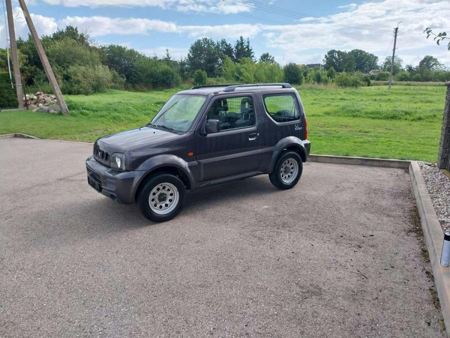 Pelēks Suzuki Jimny 2012 Marijampole, ar dzinēja tilpumu 1.33 L un nobraukumu 97 tūkst. km par 6900 €, foto 16 vietnē AUTOMOTO.COM.LV