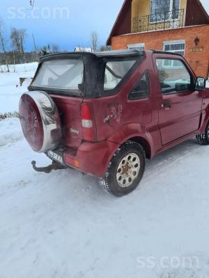 Red Suzuki Jimny 2000 in Madona, with an engine capacity of 1.30 L and mileage of 173 thousand km for 1750 €, photo 3 on AUTOMOTO.COM.LV