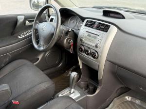 Grey Suzuki Liana 2007 in Vilnius, with an engine capacity of 1.59 L and mileage of 220 thousand km for 1350 €, photo 12 on AUTOMOTO.COM.LV