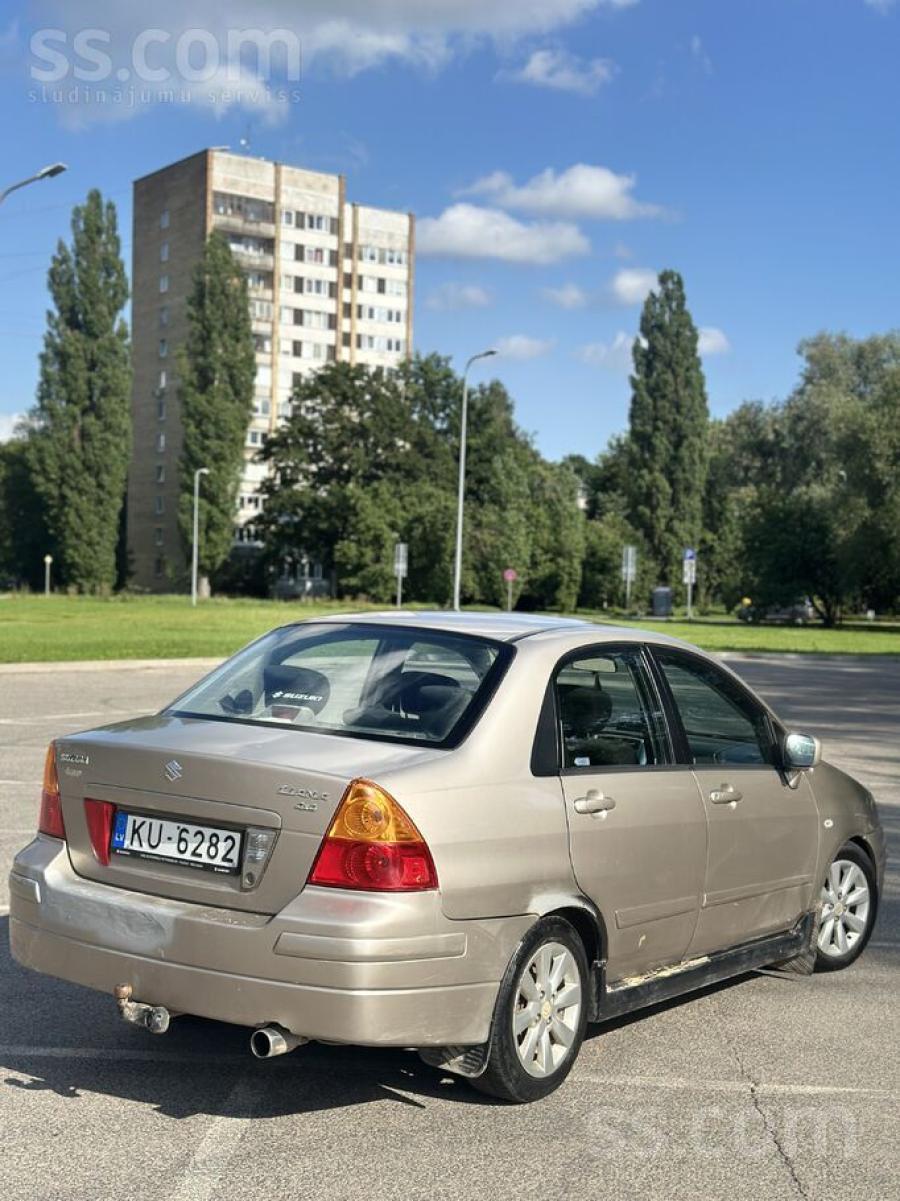 Pelēks Suzuki Liana 2005 Rīga, ar dzinēja tilpumu 1.60 L un nobraukumu 222 tūkst. km par 870 €, foto 4 vietnē AUTOMOTO.COM.LV