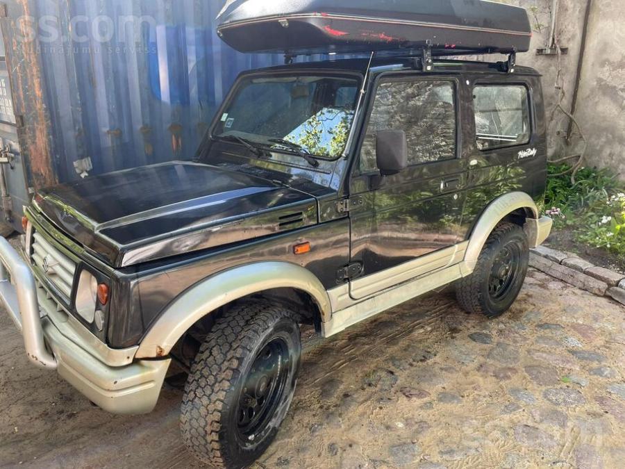 Melns Suzuki Samurai 1999 Liepāja, ar dzinēja tilpumu 1.90 L un nobraukumu 224 tūkst. km par 4500 €, foto 1 vietnē AUTOMOTO.COM.LV