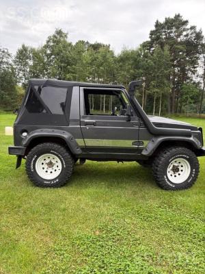 Pelēks Suzuki Samurai 1998 Liepāja, ar dzinēja tilpumu 1.60 L un nobraukumu 30 tūkst. km par 12000 €, foto 13 vietnē AUTOMOTO.COM.LV