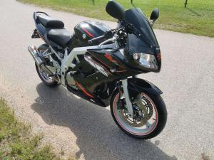 Melns Suzuki SV 2005 Jurbarkas, ar dzinēja tilpumu 0.65 L un nobraukumu 42 tūkst. km par 2100 €, foto 3 vietnē AUTOMOTO.COM.LV
