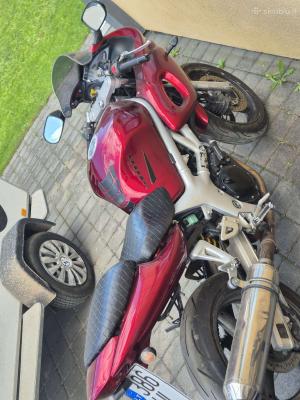 Sarkans Suzuki SV 2000 Kauņa, ar dzinēja tilpumu 0.65 L un nobraukumu 68 tūkst. km par 800 €, foto 5 vietnē AUTOMOTO.COM.LV