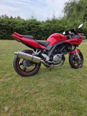 Red Suzuki SV 2005 in Kaunas, with an engine capacity of 0.65 L and mileage of 77 thousand km for 3000 €, photo 9 on AUTOMOTO.COM.LV