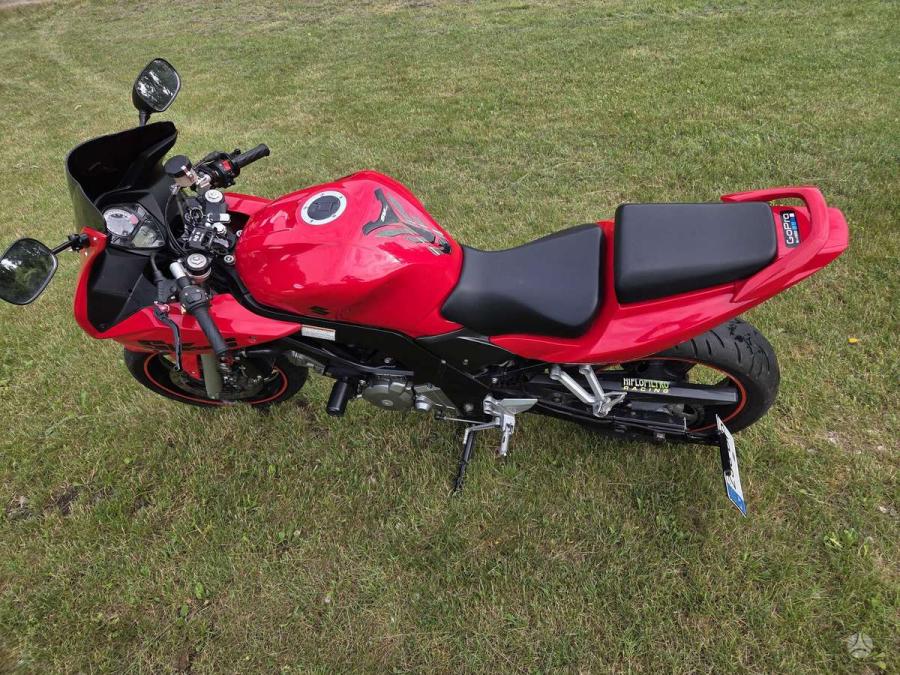 Red Suzuki SV 2005 in Kaunas, with an engine capacity of 0.65 L and mileage of 77 thousand km for 3000 €, photo 10 on AUTOMOTO.COM.LV