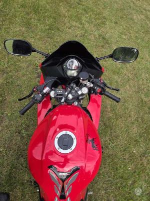 Red Suzuki SV 2005 in Kaunas, with an engine capacity of 0.65 L and mileage of 77 thousand km for 3000 €, photo 11 on AUTOMOTO.COM.LV