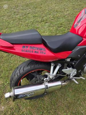 Red Suzuki SV 2005 in Kaunas, with an engine capacity of 0.65 L and mileage of 77 thousand km for 3000 €, photo 12 on AUTOMOTO.COM.LV