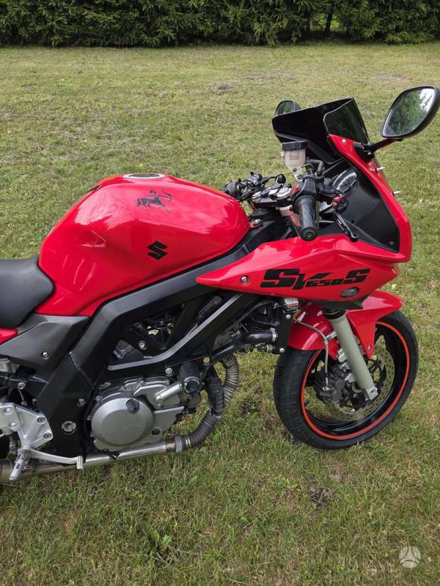 Red Suzuki SV 2005 in Kaunas, with an engine capacity of 0.65 L and mileage of 77 thousand km for 3000 €, photo 13 on AUTOMOTO.COM.LV