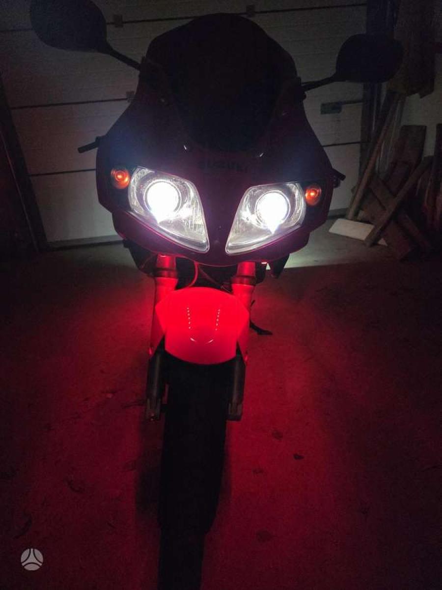 Red Suzuki SV 2005 in Kaunas, with an engine capacity of 0.65 L and mileage of 77 thousand km for 3000 €, photo 18 on AUTOMOTO.COM.LV