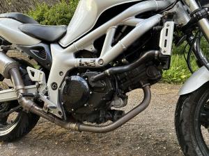 White Suzuki SV 1999 in Vilnius, with an engine capacity of 0.65 L and mileage of 30 thousand km for 1300 €, photo 8 on AUTOMOTO.COM.LV