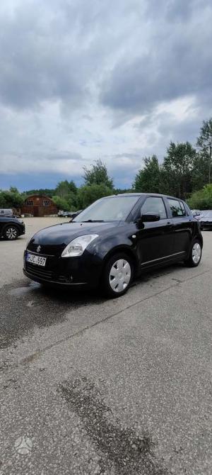 Black Suzuki Swift 2005 in Vilnius, with an engine capacity of 1.33 L and mileage of 255 thousand km for 900 €, photo  on AUTOMOTO.COM.LV