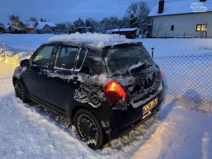 Black Suzuki Swift 2006 in Vilnius, with an engine capacity of 1.30 L and mileage of 180 thousand km for 1100 €, photo 4 on AUTOMOTO.COM.LV