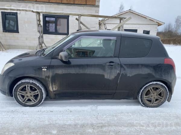 Melns Suzuki Swift 2006 Rīga, ar dzinēja tilpumu 1.50 L un nobraukumu 245 tūkst. km par 1999 €, foto 3 vietnē AUTOMOTO.COM.LV
