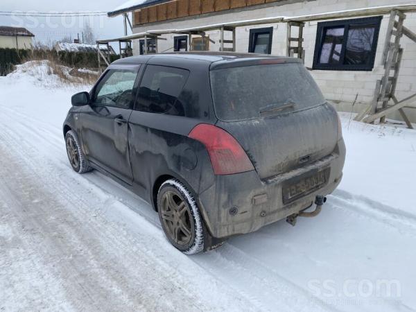 Melns Suzuki Swift 2006 Rīga, ar dzinēja tilpumu 1.50 L un nobraukumu 245 tūkst. km par 1999 €, foto 4 vietnē AUTOMOTO.COM.LV