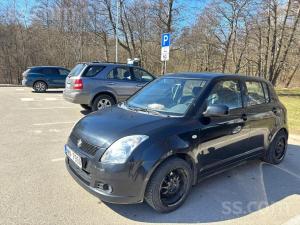 Melns Suzuki Swift 2006 Liepāja, ar dzinēja tilpumu 1.30 L un nobraukumu 390 tūkst. km par 799 €, foto  vietnē AUTOMOTO.COM.LV