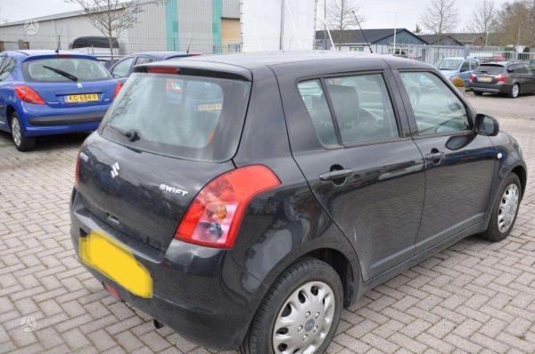 Black Suzuki Swift 2011 in Kaunas, with an engine capacity of 1.24 L and mileage of 299 thousand km for 1900 €, photo 3 on AUTOMOTO.COM.LV