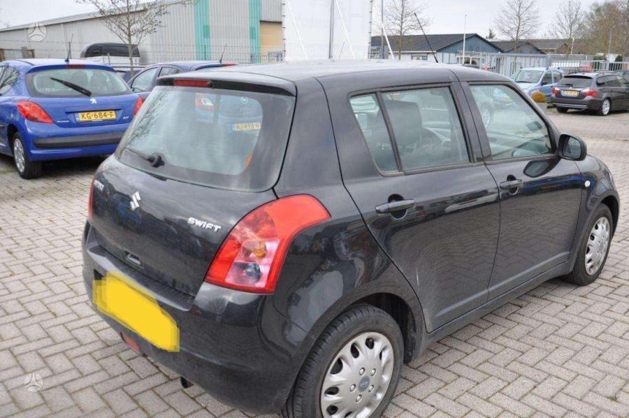 Black Suzuki Swift 2011 in Kaunas, with an engine capacity of 1.24 L and mileage of 299 thousand km for 1900 €, photo 3 on AUTOMOTO.COM.LV