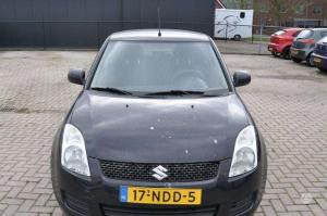 Black Suzuki Swift 2011 in Kaunas, with an engine capacity of 1.24 L and mileage of 299 thousand km for 1900 €, photo 4 on AUTOMOTO.COM.LV