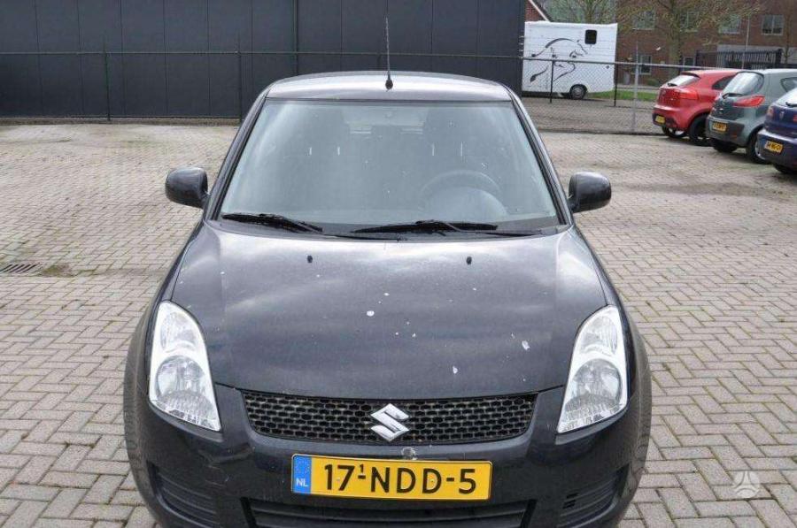 Black Suzuki Swift 2011 in Kaunas, with an engine capacity of 1.24 L and mileage of 299 thousand km for 1900 €, photo 4 on AUTOMOTO.COM.LV