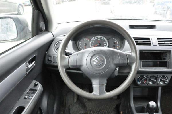 Black Suzuki Swift 2011 in Kaunas, with an engine capacity of 1.24 L and mileage of 299 thousand km for 1900 €, photo 6 on AUTOMOTO.COM.LV