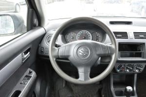Black Suzuki Swift 2011 in Kaunas, with an engine capacity of 1.24 L and mileage of 299 thousand km for 1900 €, photo 6 on AUTOMOTO.COM.LV