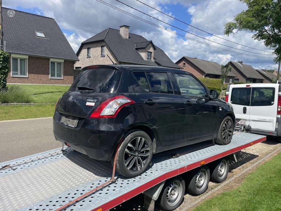 Black Suzuki Swift 2016 in Kaunas, with an engine capacity of 1.30 L and mileage of 200 thousand km for 1950 €, photo 4 on AUTOMOTO.COM.LV