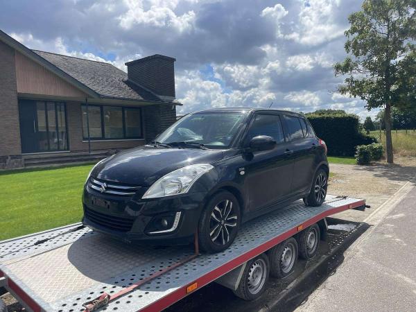 Black Suzuki Swift 2016 in Kaunas, with an engine capacity of 1.30 L and mileage of 200 thousand km for 1950 €, photo 7 on AUTOMOTO.COM.LV