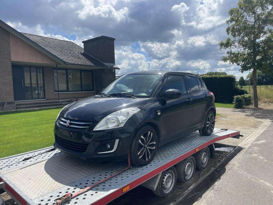 Black Suzuki Swift 2016 in Kaunas, with an engine capacity of 1.30 L and mileage of 200 thousand km for 1950 €, photo 8 on AUTOMOTO.COM.LV