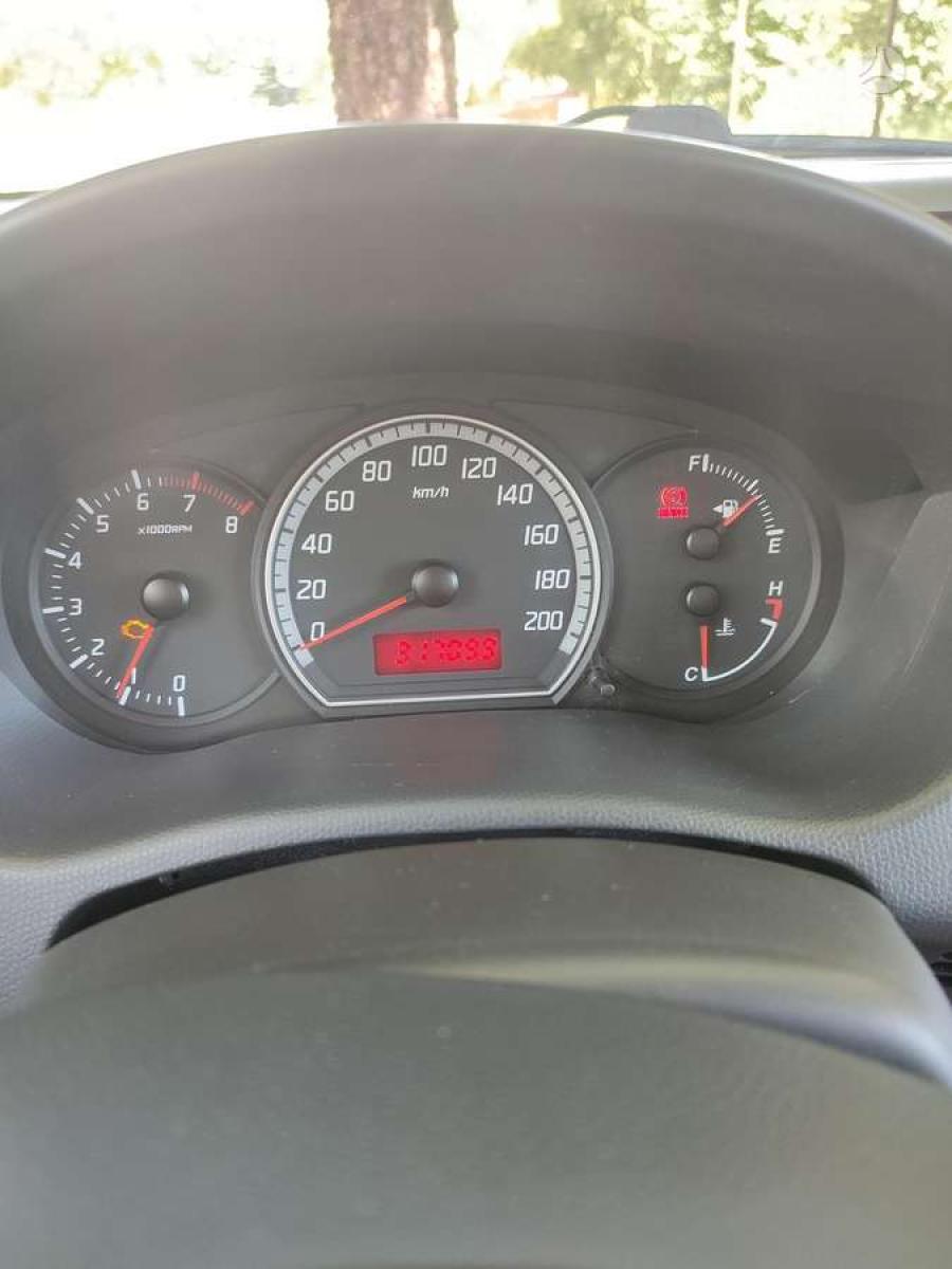 Zils Suzuki Swift 2005 Alīta, ar dzinēja tilpumu 1.49 L un nobraukumu 317 tūkst. km par 1000 €, foto 13 vietnē AUTOMOTO.COM.LV