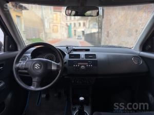 Zils Suzuki Swift 2006 Cēsis, ar dzinēja tilpumu 1.30 L un nobraukumu 228 tūkst. km par 1490 €, foto 13 vietnē AUTOMOTO.COM.LV