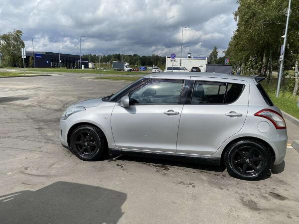 Suzuki Swift 2011 Viļņa vietnē Pelēks Suzuki Swift 2011 Viļņa, ar dzinēja tilpumu 1.24 L un nobraukumu 174 tūkst. km par 3700 €, foto 7 vietnē AUTOMOTO.COM.LV