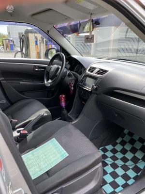 Pelēks Suzuki Swift 2011 Viļņa, ar dzinēja tilpumu 1.24 L un nobraukumu 174 tūkst. km par 3700 €, foto 11 vietnē AUTOMOTO.COM.LV