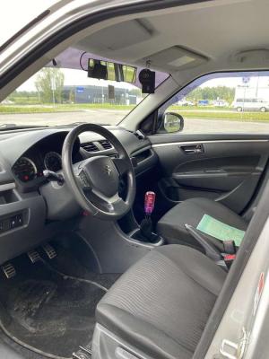Pelēks Suzuki Swift 2011 Viļņa, ar dzinēja tilpumu 1.24 L un nobraukumu 174 tūkst. km par 3700 €, foto 14 vietnē AUTOMOTO.COM.LV