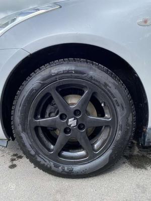 Pelēks Suzuki Swift 2011 Viļņa, ar dzinēja tilpumu 1.24 L un nobraukumu 174 tūkst. km par 3700 €, foto 17 vietnē AUTOMOTO.COM.LV