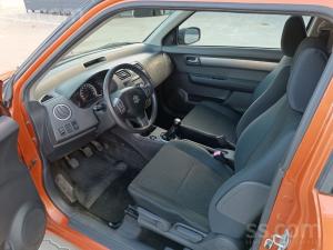 Orange Suzuki Swift 2006 in Riga, with an engine capacity of 1.30 L and mileage of 93 thousand km for 2990 €, photo 19 on AUTOMOTO.COM.LV