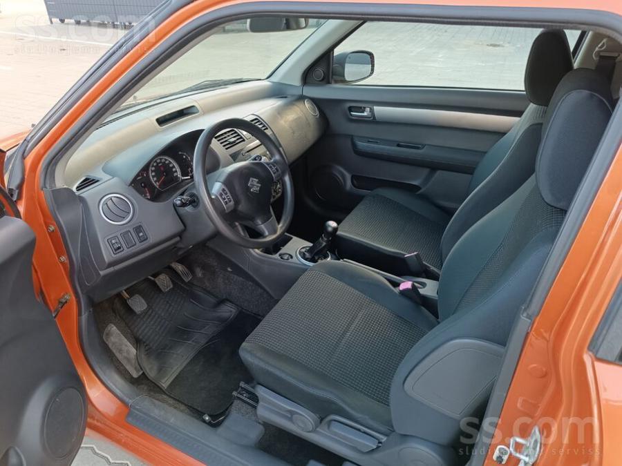 Orange Suzuki Swift 2006 in Riga, with an engine capacity of 1.30 L and mileage of 93 thousand km for 2990 €, photo 19 on AUTOMOTO.COM.LV