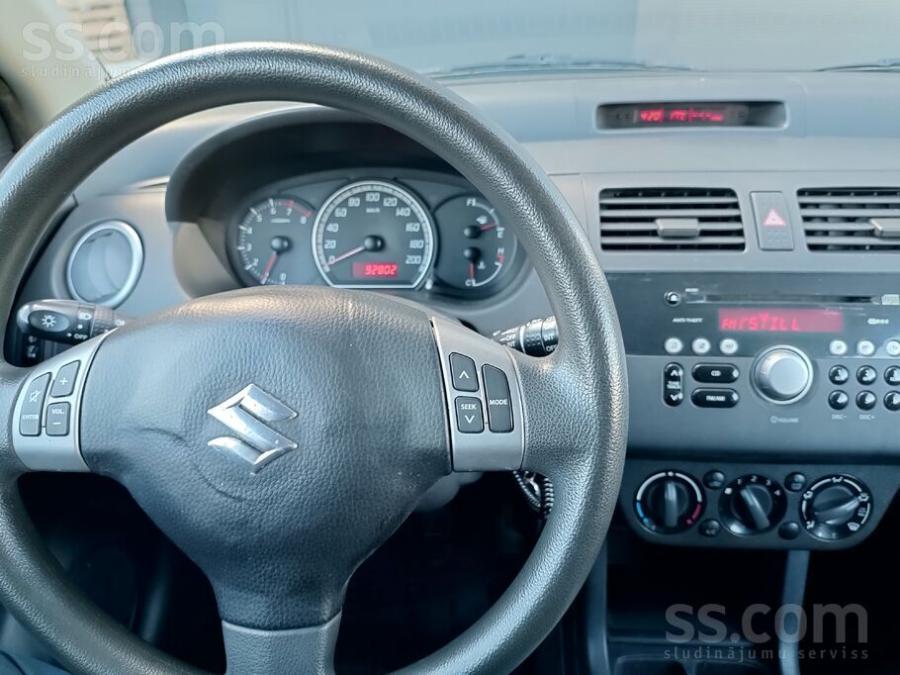 Orange Suzuki Swift 2006 in Riga, with an engine capacity of 1.30 L and mileage of 93 thousand km for 2990 €, photo 25 on AUTOMOTO.COM.LV