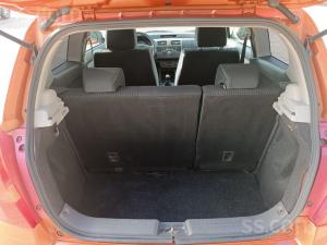 Orange Suzuki Swift 2006 in Riga, with an engine capacity of 1.30 L and mileage of 93 thousand km for 2990 €, photo 26 on AUTOMOTO.COM.LV
