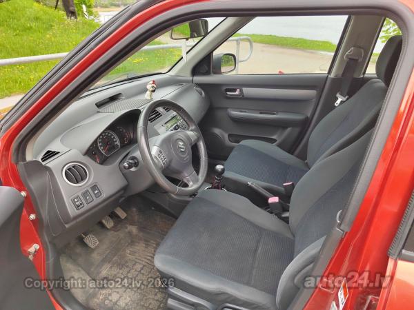 Orange Suzuki Swift 2010 in Narva, with an engine capacity of 1.30 L and mileage of 158 thousand km for 2999 €, photo 4 on AUTOMOTO.COM.LV